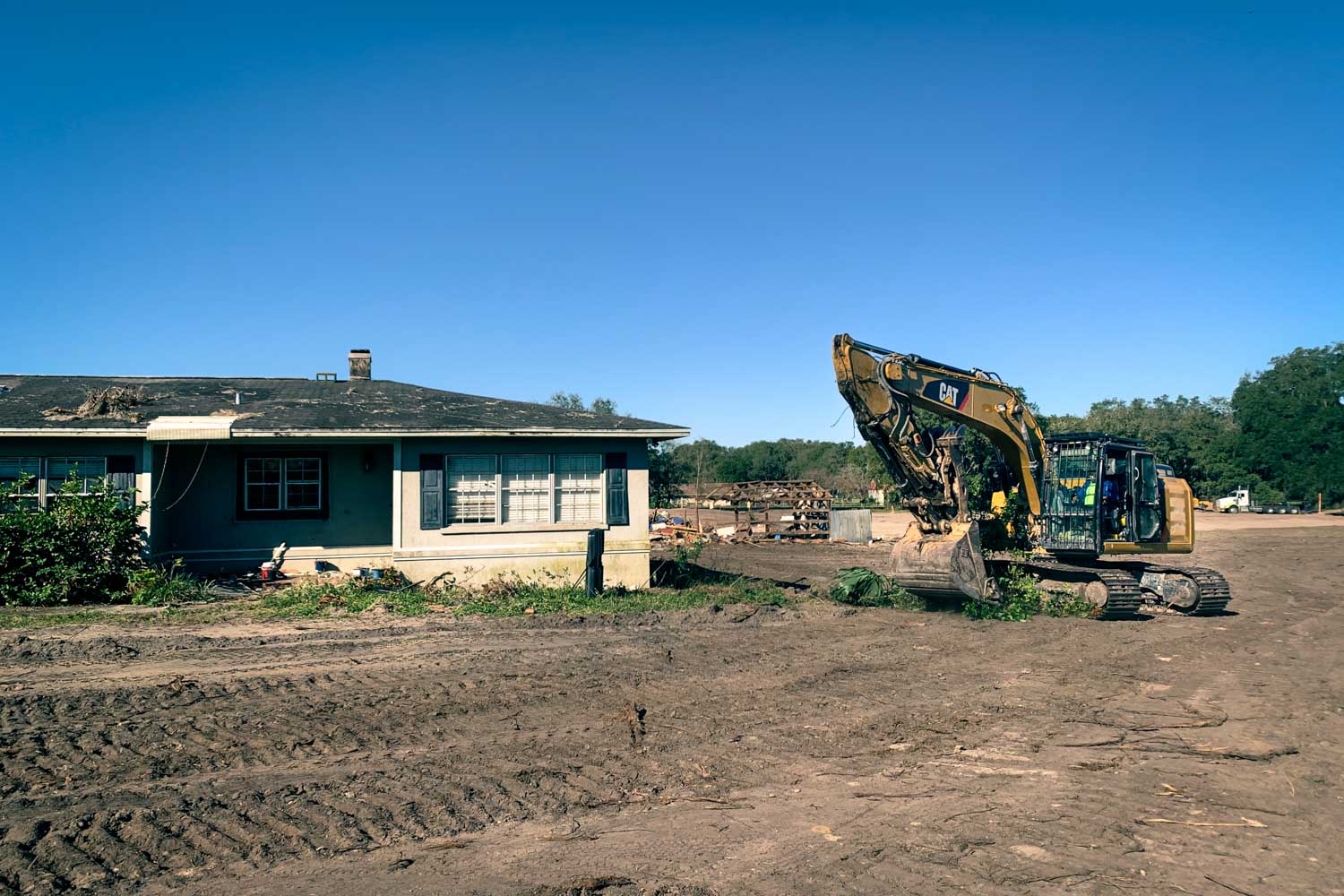 Demolishing an Overgrown Home - AAA Service Company