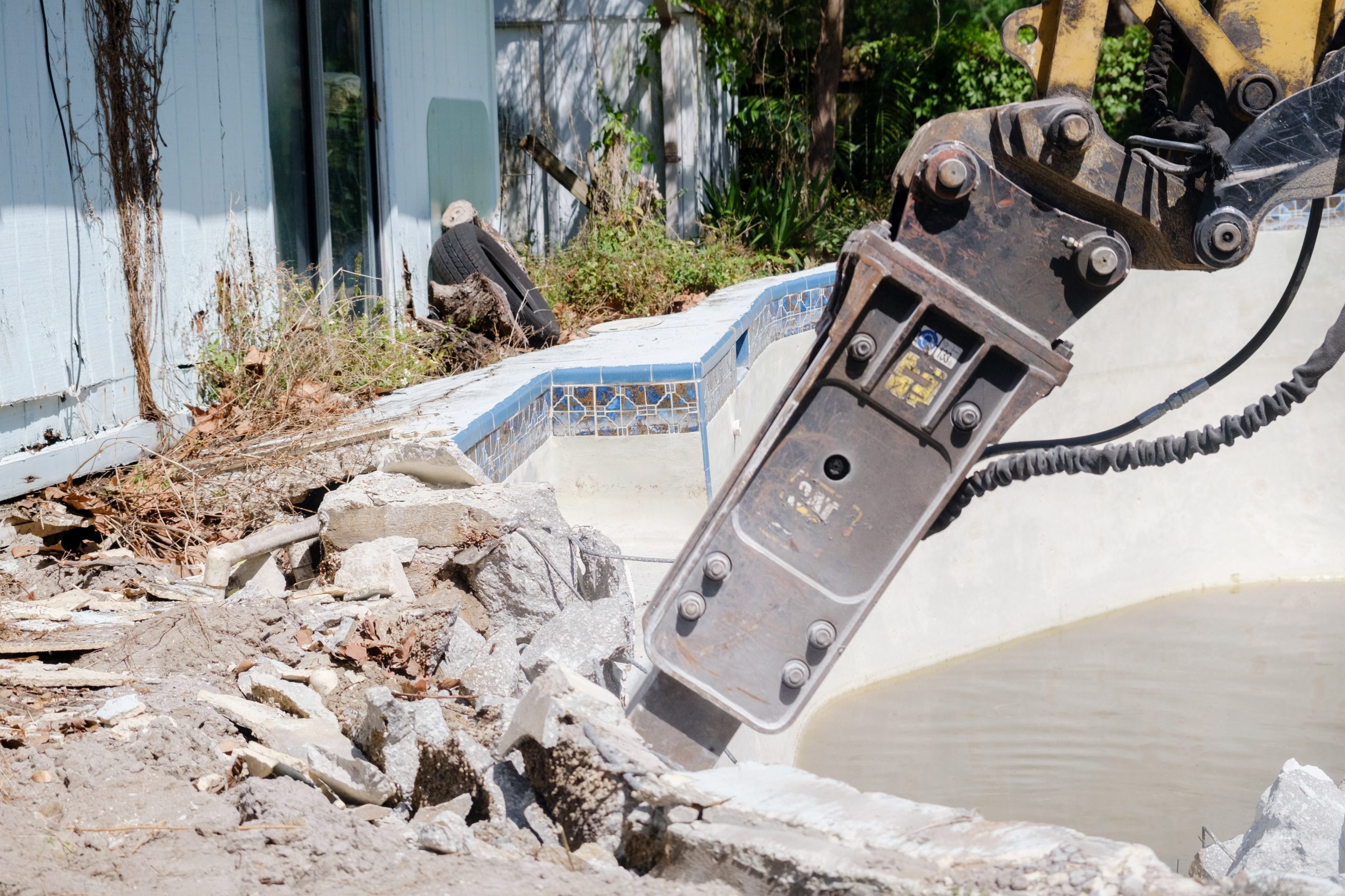 Popped-Loose Pool Demolition - AAA Service Company